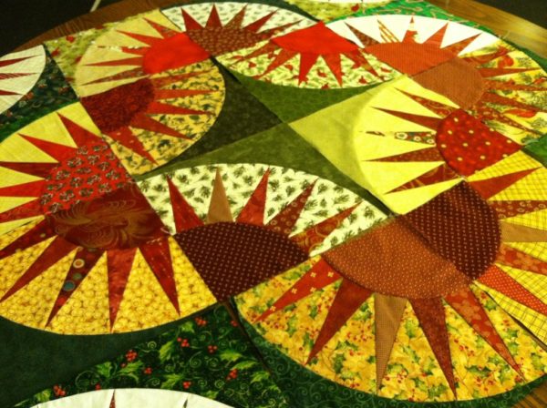 Quilt top reveal: Maple Leaf Log Cabin – Quilt Addicts Anonymous